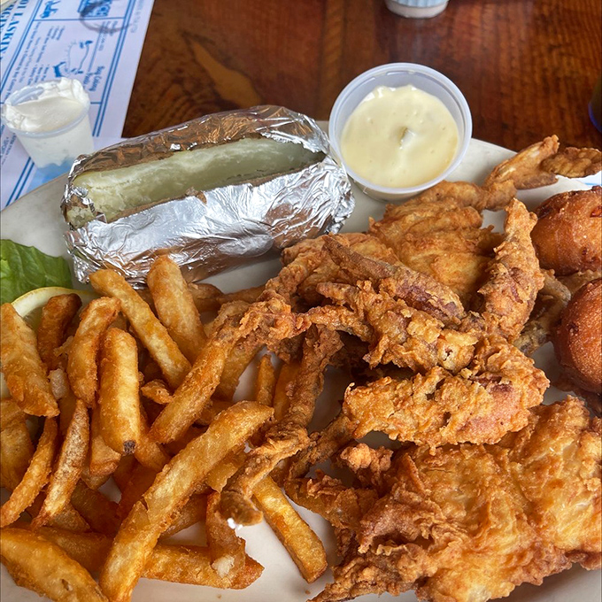 Soft shell crabs that look like they've been studying the art of frying perfection for decades. The biscuit is just showing off.