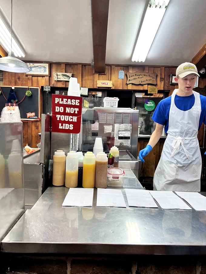 Behind every great burger is a dedicated team member, carefully assembling your order with the precision of a Swiss watchmaker.