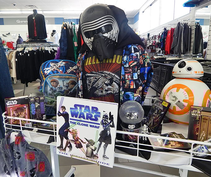 The Force is strong in this display! Star Wars merchandise stands ready to transport fans to galaxies far, far away.