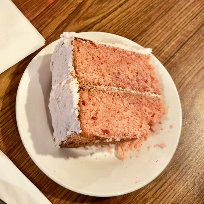 The strawberry cake glows with a pink hue that would make Barbie jealous. Two perfect layers of nostalgia frosted with pure happiness.