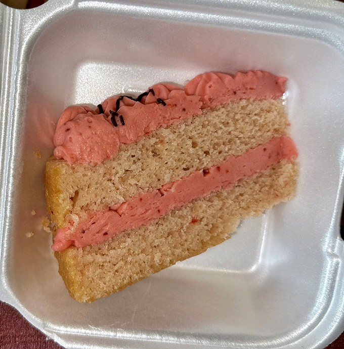 A slice of strawberry cake that doesn't need fancy decorations to make its point&mdash;just honest-to-goodness flavor that would make grandma proud.