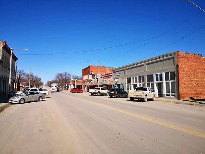Blue skies stretch endlessly above Strong City's quiet streets, where pickup trucks outnumber sedans and everybody knows your business.