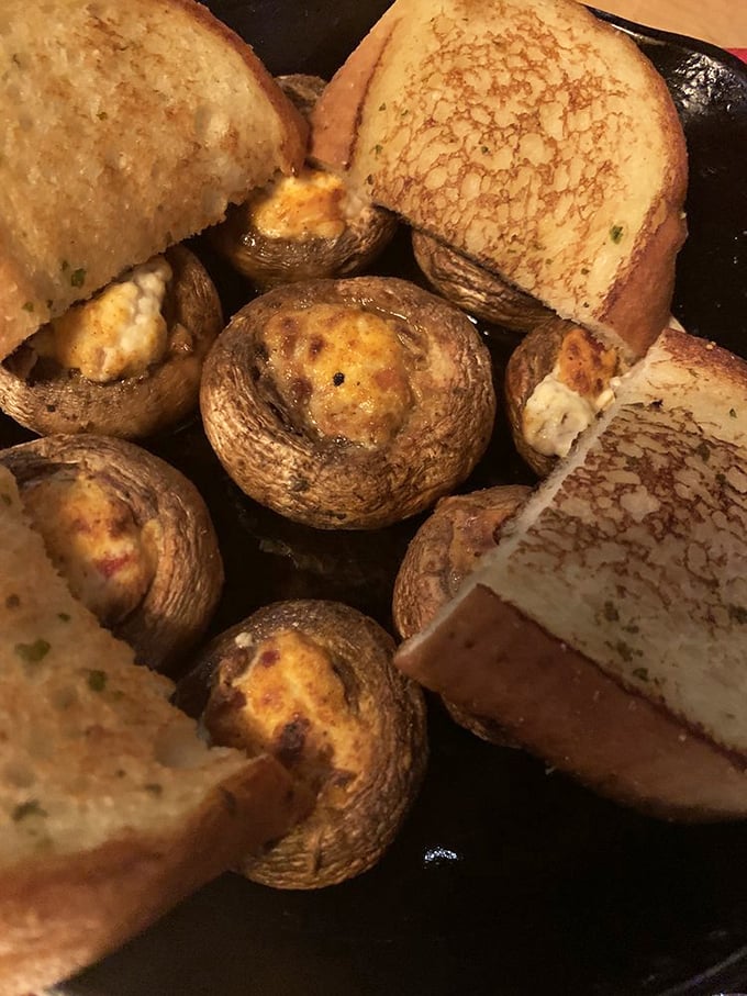 These stuffed mushrooms aren't just appetizers&mdash;they're little umami bombs surrounded by perfectly toasted garlic bread.