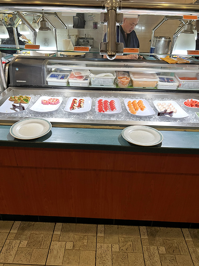 Behind the sushi counter, artistry happens in real-time as chefs transform simple ingredients into colorful, bite-sized masterpieces.