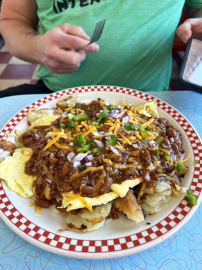 The Super Stretch in all its glory &ndash; a topographical map of flavor with hash browns as the foundation and chili, cheese, and veggies creating delicious peaks and valleys.