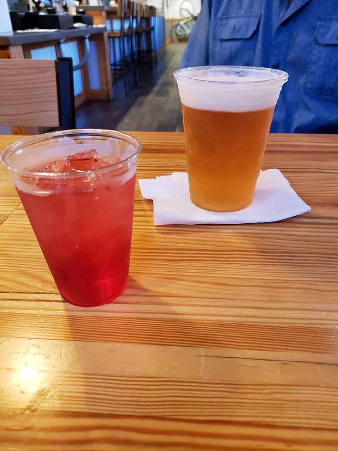The yin and yang of refreshment&mdash;amber beer and ruby cranberry drink standing by, ready to cleanse your palate between bites of barbecue bliss.