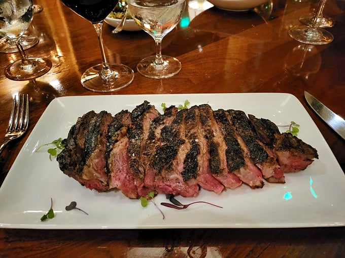 Sliced Tomahawk steak: where primal meets refined. The kind of dish that makes vegetarians momentarily question their life choices.