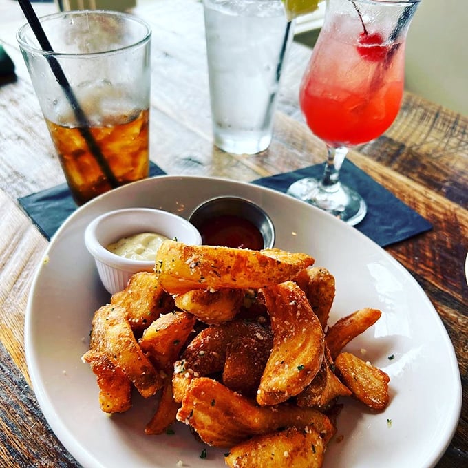 These aren't just fries&mdash;they're golden, crispy vehicles for delivering truffle-scented happiness to your face. Dipping sauce optional but highly recommended.