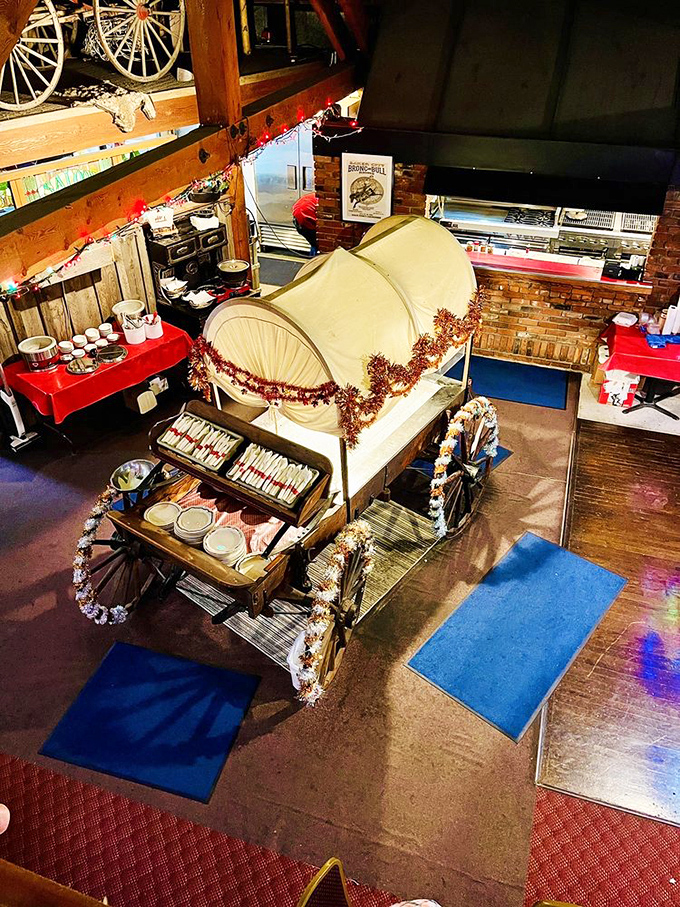 The covered wagon salad bar isn't just functional, it's a masterclass in thematic commitment that would make Walt Disney slow-clap with approval. 