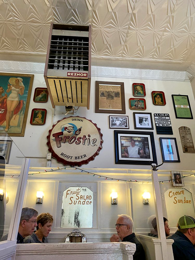 Vintage advertisements and nostalgic memorabilia cover walls that have witnessed generations of St. Louis celebrations and first dates.