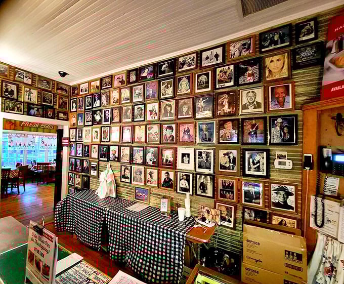 The wall of fame showcases decades of celebrity visitors who made the pilgrimage for biscuits. Fame is temporary, but good butter is forever.