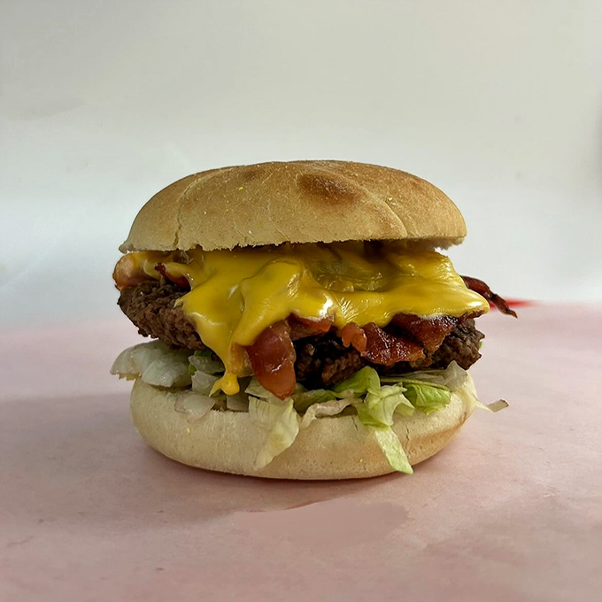 The bacon cheeseburger that makes fast food chains weep with inadequacy. Simple, honest, and unapologetically delicious.