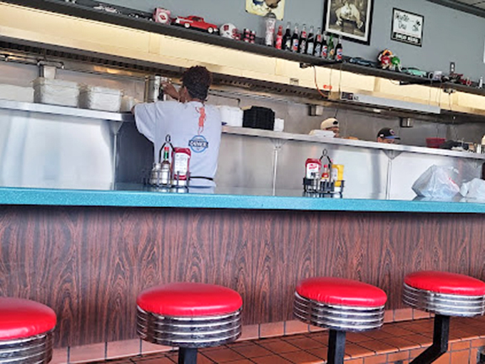 These stools have heard more stories than a bartender, held more dreams than a pillow, and supported more hungry folks than a food bank.