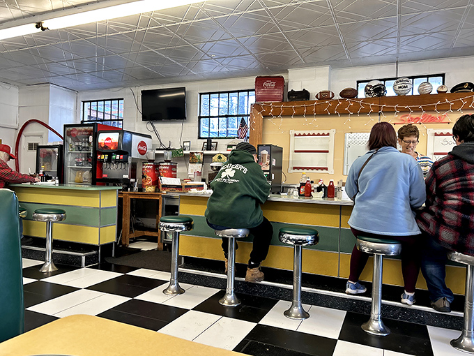 The counter seating &ndash; where solo diners become regulars and servers remember how you take your coffee before you sit down.