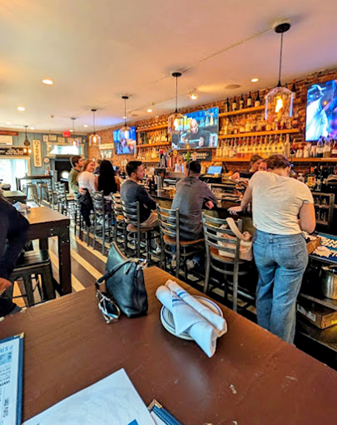 The bar area hums with the energy of seafood pilgrims who've found their promised land. Brick walls have heard countless "mmms" of satisfaction.