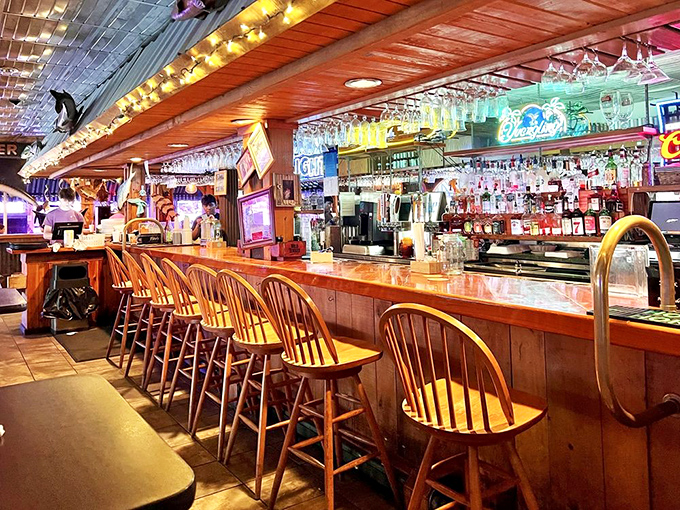 Where stories flow as freely as the drinks. The wooden bar area invites you to pull up a chair and stay awhile.