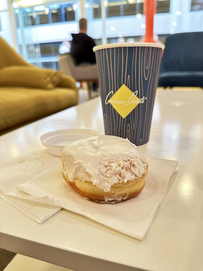 A glazed masterpiece awaits its fate beside a signature cup. Some relationships are complicated; this one is simply perfect.