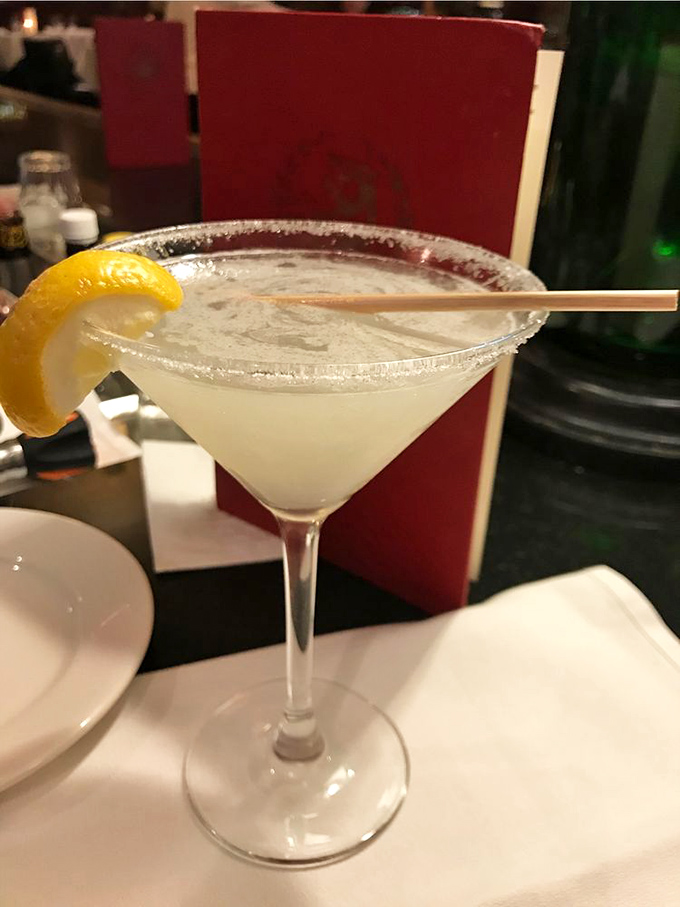 A lemony cocktail with a sugar rim waits to cleanse your palate between bites of beef&mdash;or provide liquid courage before the check arrives.