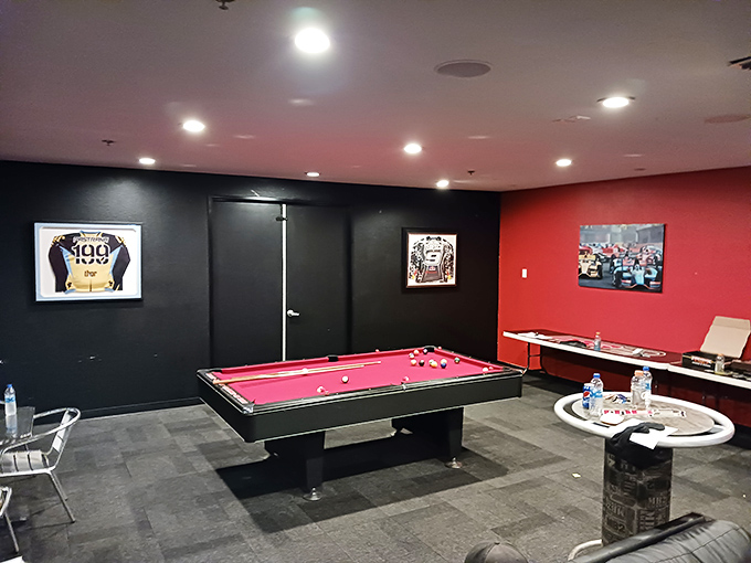 The billiards room: where racing rivalries continue with different equipment but equally intense concentration and questionable strategy.