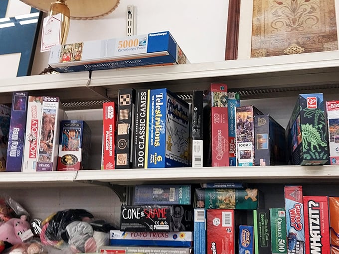 Board games stacked like time machines, ready to transport families back to rainy afternoons before screens dominated our attention spans.