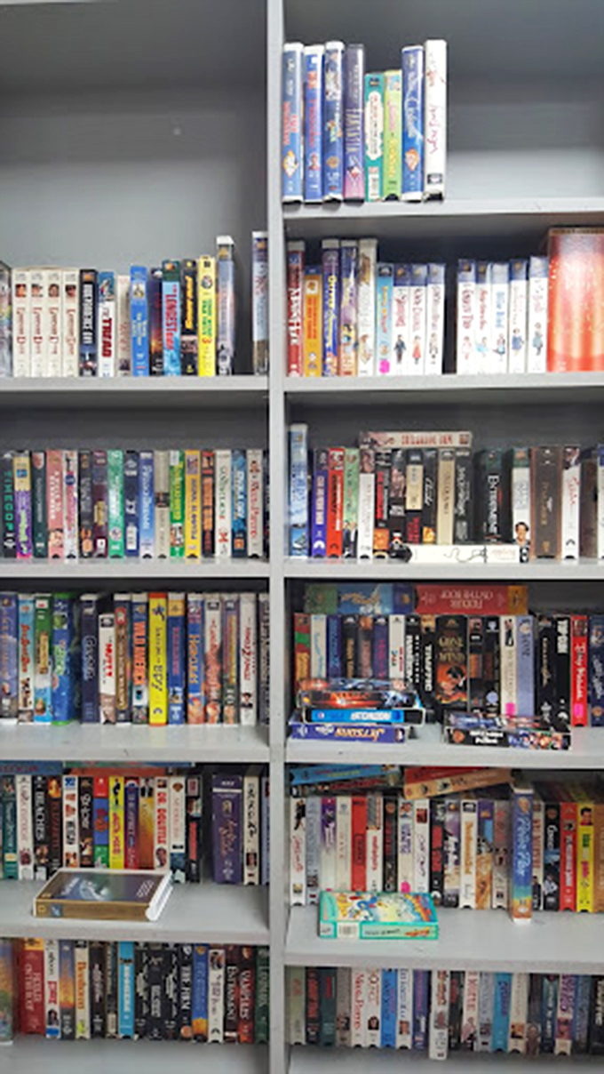 The VHS library rivals your childhood Blockbuster memories. Physical media collectors, this is your paradise of plastic nostalgia!