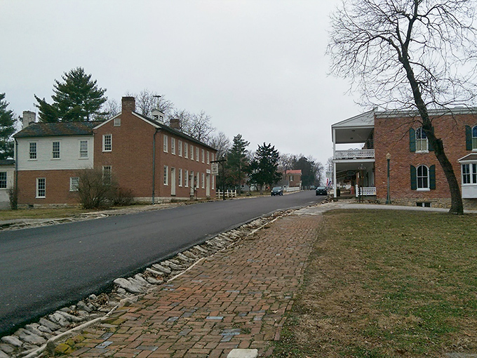 Historic brick buildings line streets that once echoed with stagecoach wheels, now quietly preserving stories between their weathered walls.