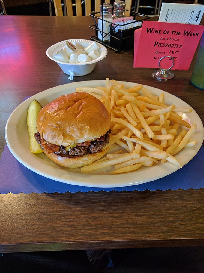 The burger arrives like an old friend&mdash;unpretentious, reliable, and exactly what you need after a long day of adulting.