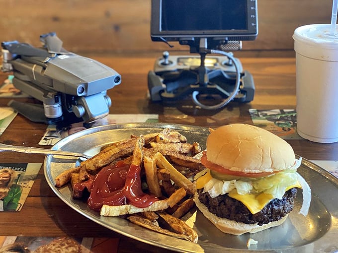 Burger with fries: For those moments when you crave beef but not the full steak commitment. This burger deserves its own fan club and highway billboard.