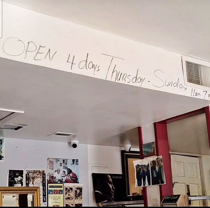When a restaurant posts hours with marker on the wall, you know they're focused on cooking, not interior design. Priorities in perfect order.