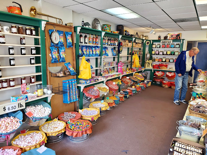 Metal tubs of colorful candies create the world's most joyful geology lesson – sedimentary layers of sugar waiting to be excavated.