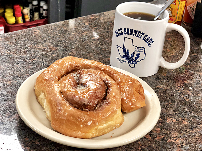 That cinnamon roll isn't dessert; it's your reward for making it to the Blue Bonnet. Pair it with their house coffee and suddenly Monday feels manageable.