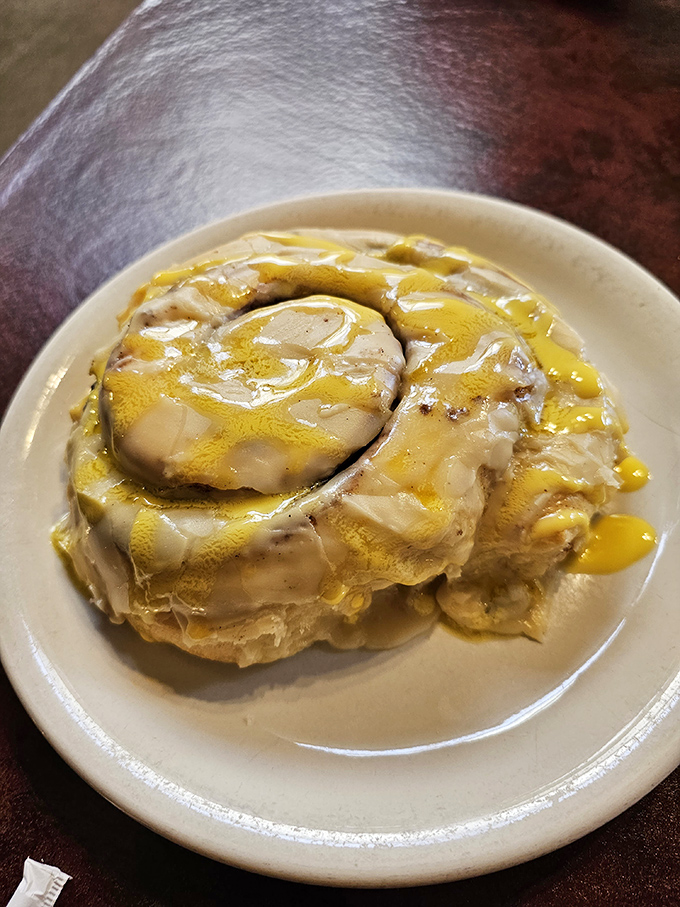 Not so much a cinnamon roll as a life-changing experience with frosting. Size matters, and this one's winning the competition.