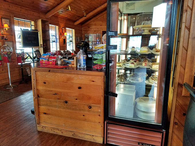The dessert counter and wooden cashier station whisper of simpler times, when food was made with care and sweet endings were non-negotiable.
