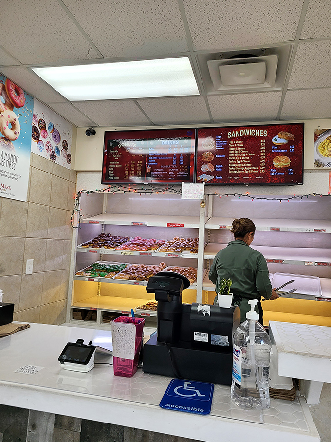 The counter where dreams come true. Notice how even when nearly empty, the display radiates donut-making confidence.