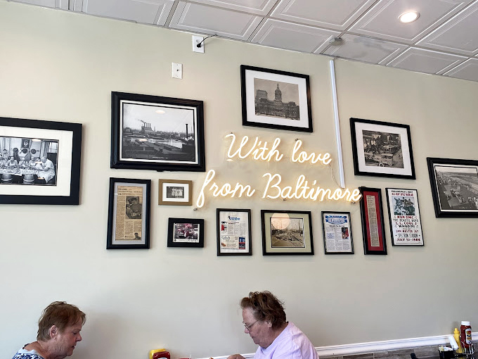 "With love from Baltimore" isn't just wall decor&mdash;it's the G&A philosophy. These walls tell stories of a city's history through its beloved comfort food.