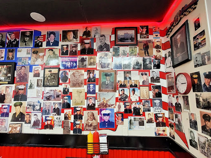 The wall of military photos speaks volumes about community pride&mdash;each frame a story, each face a reminder of service beyond the call of fries.