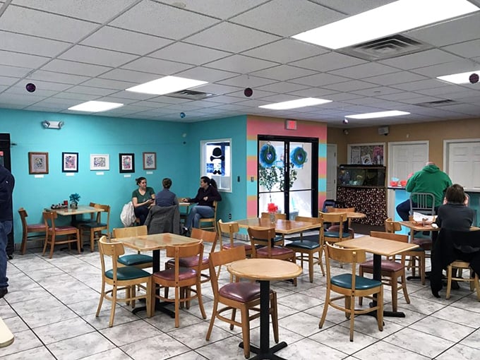 Regulars know that these tables aren't just for eating&mdash;they're for the sacred ritual of the first bite, where strangers become united in donut appreciation.