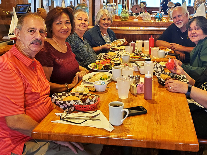 The true measure of a great seafood joint? Tables filled with happy locals sharing stories as freely as they share hushpuppies.