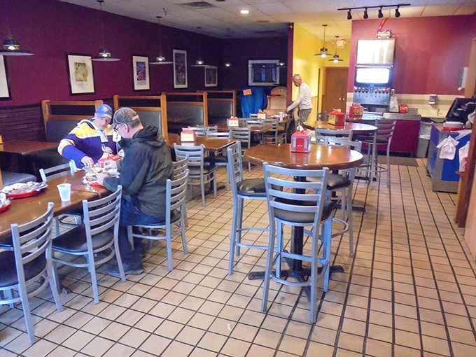 Happy campers in BBQ land! These diners are living their best lives, proving that good food brings people together like nothing else.