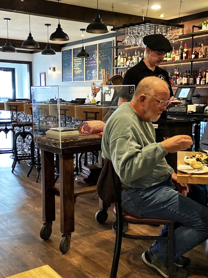 The dining room blends modern elements with rustic charm, creating a space where both special occasions and casual gatherings feel equally at home.