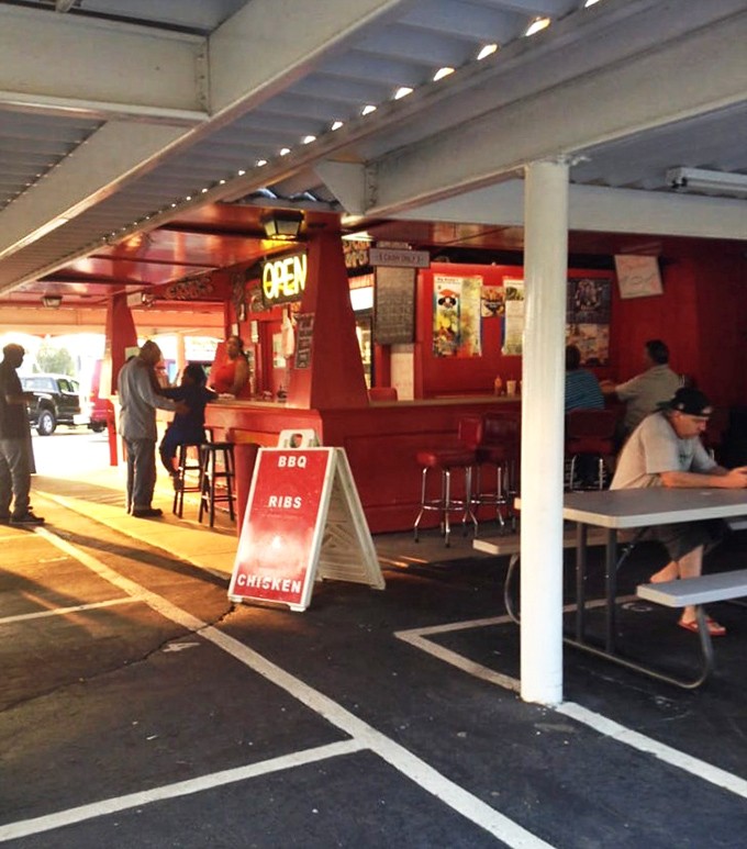 Under the shelter of Big Daddy's awning, strangers become neighbors, united by the universal language of "pass the napkins, please."