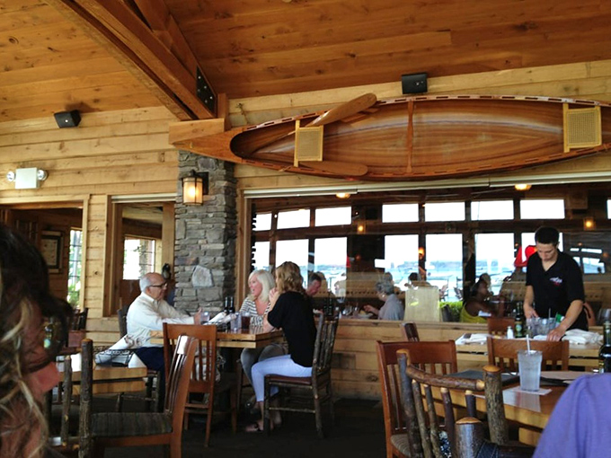 Where conversations flow as smoothly as the wine, under the watchful gaze of a perfectly positioned canoe.
