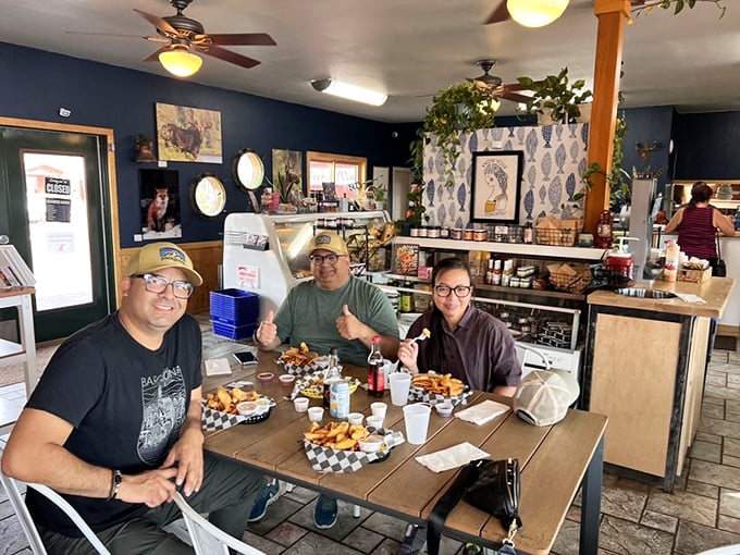 Happy diners with that unmistakable look of people who've just discovered something too good to keep secret. The smiles say it all.