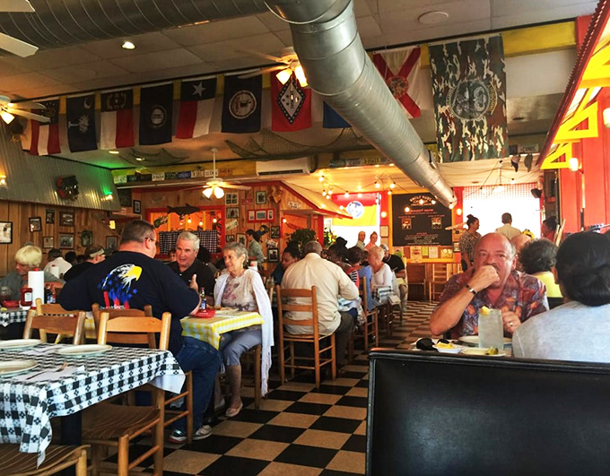 A dining room where strangers become neighbors over shared appreciation of comfort food. The United Nations of fried deliciousness.
