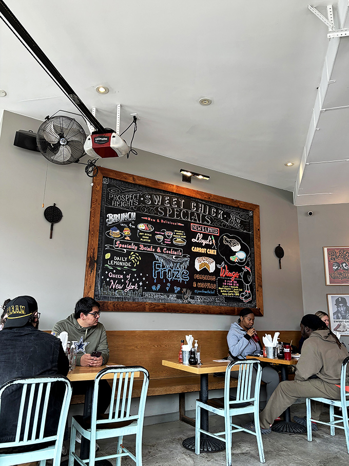 The chalkboard of specials looms large as diners settle in, plotting their culinary strategy like generals before a delicious battle.