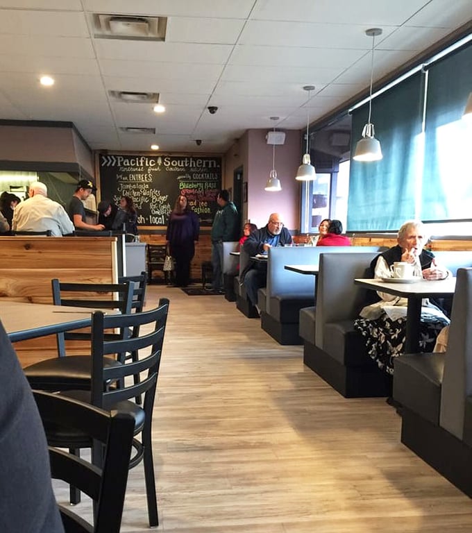 A bustling dining room where strangers become temporary friends united by the universal language of "mmm" and "you've got to try this."