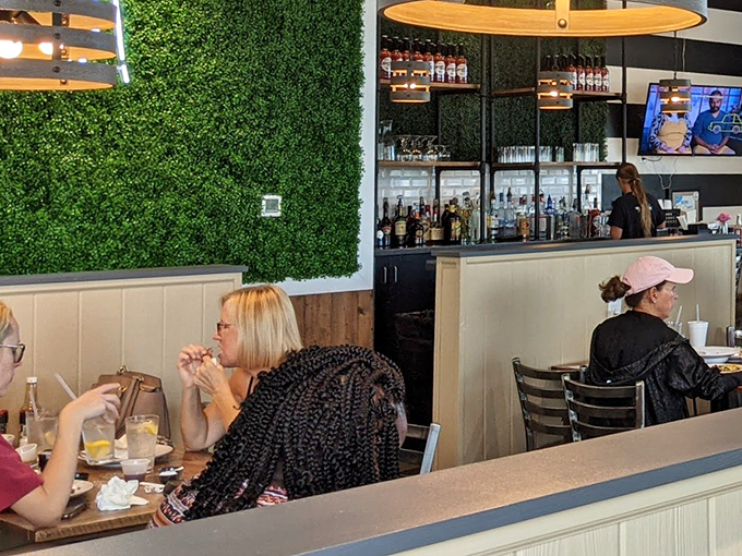 Where food dreams come true while real conversations happen. The vibrant atmosphere buzzes with the energy of satisfied diners plotting their next visit.