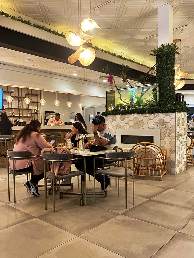 Real restaurants are about real people enjoying spectacular food. Notice how nobody's on their phone? That's the power of focus-commanding cuisine.