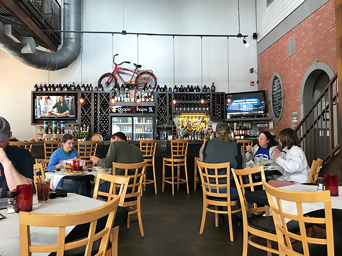 Where strangers become friends over shared food obsessions. Notice the red glasses—they're not just for drinks, they're keeping the casual vibe alive amid serious culinary business.