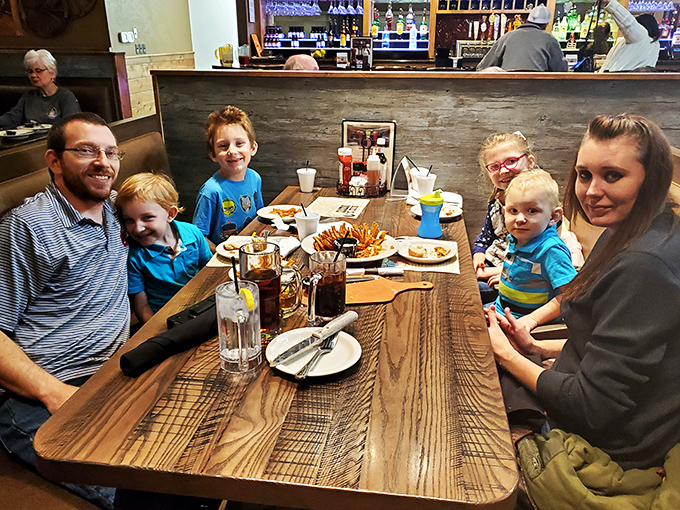 Families gathering around wooden tables, creating memories seasoned with laughter and A1 sauce. This is what restaurants were invented for.